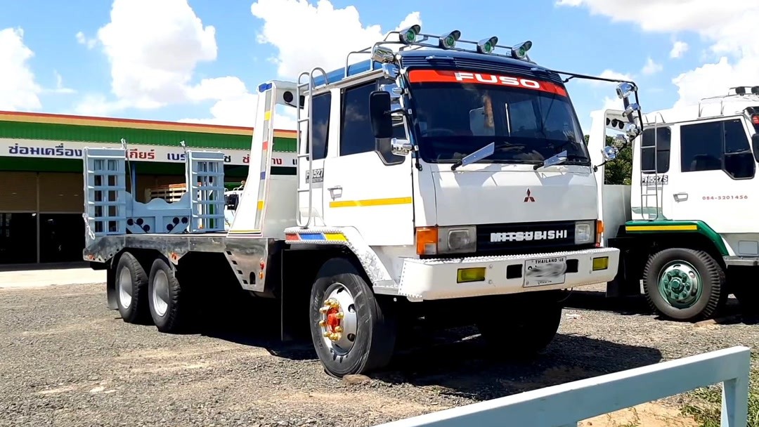 这种拖车挺不错,买一辆在农村接活,大小车都能拉,回本快