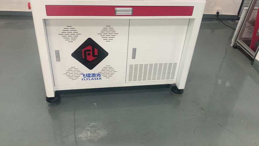 飞镭激光双头光纤激光打标机出货前的烤机测试,一机两用