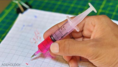 自动笔不出水怎么办拿个注射器照样可以写字