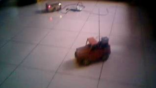 92.4.21.手工制作,用白铁皮做的两通遥控车,华油井作业,马力