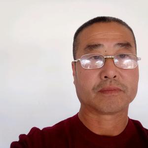 玩自媒体的60后 