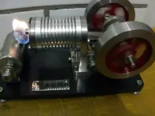 双飞轮真空吸火斯特林发动机模型