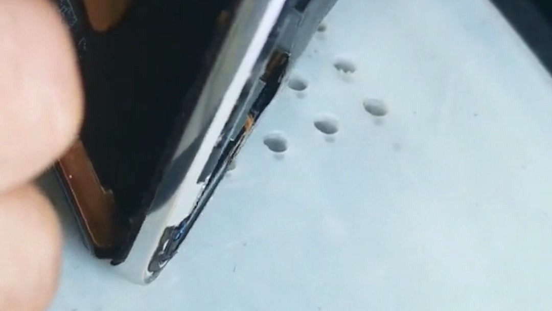 一分钟看完华为曲面屏手机怎么更换手机外屏,昆明九一手机维修