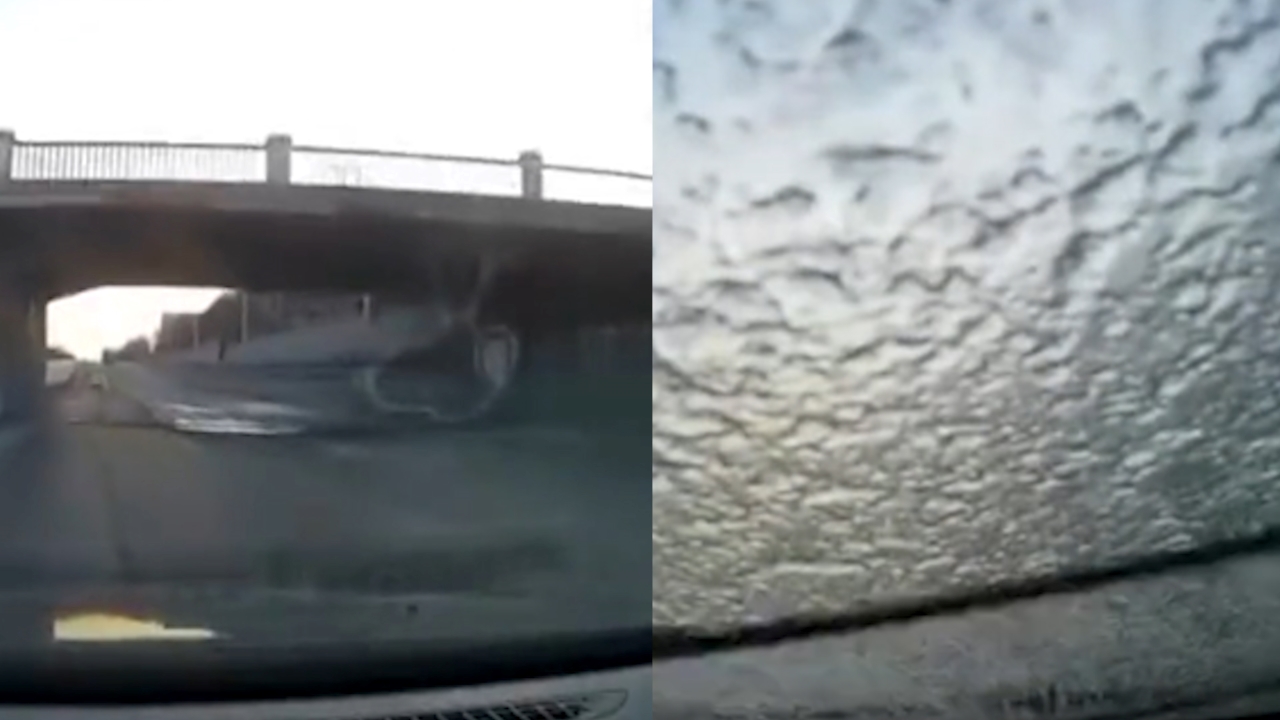 男子行车途中,前车溅起水花挡风玻璃瞬间结冰,打开雨刮器吓坏了