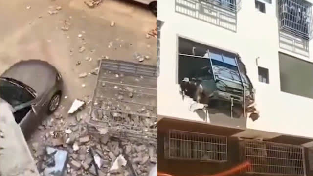 货车倒车撞车后失控冲进楼里 车头穿墙而出险些掉下