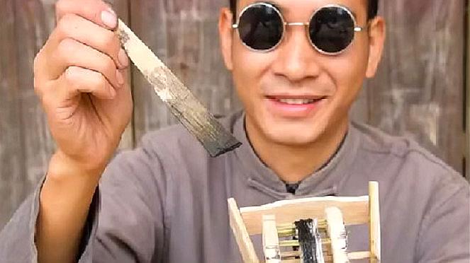 真不愧是老木匠,竟然能用竹子做出墨斗,真是不错!