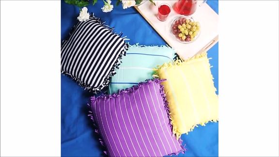 巧手妈妈们的最爱:自己动手,用旧T恤制作抱枕套