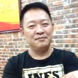 百姓梁卓成 