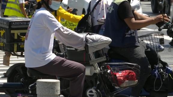 广州推出“扫码劝导”模式,治理电动自行车乱象