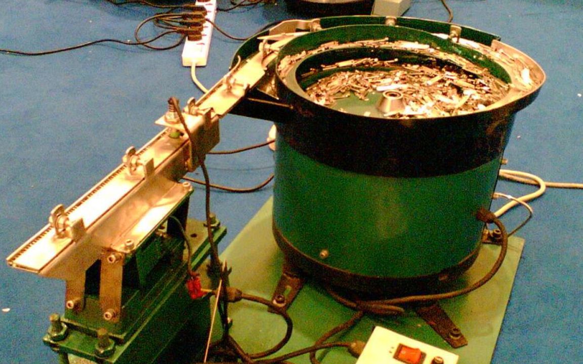 上料机构振动盘的缓冲机构设计、设计的意义、机构选择