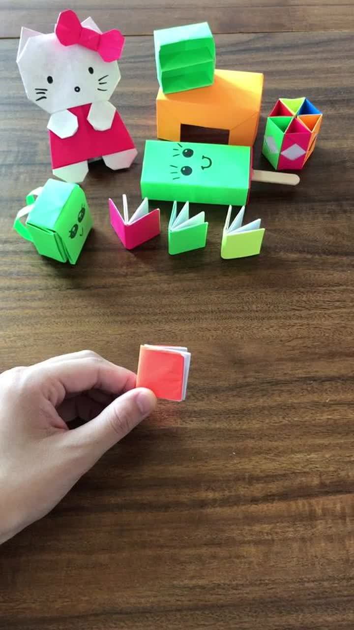 一张纸折笔记本折纸教程,前面步骤跟收纳盒折纸相似