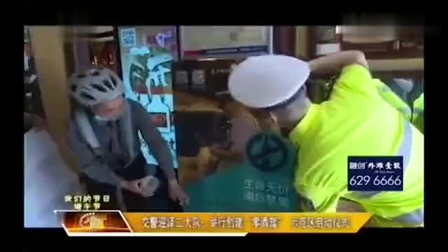 太原交警走进社区,加大“一盔一带”宣传,倡导市民安全出行