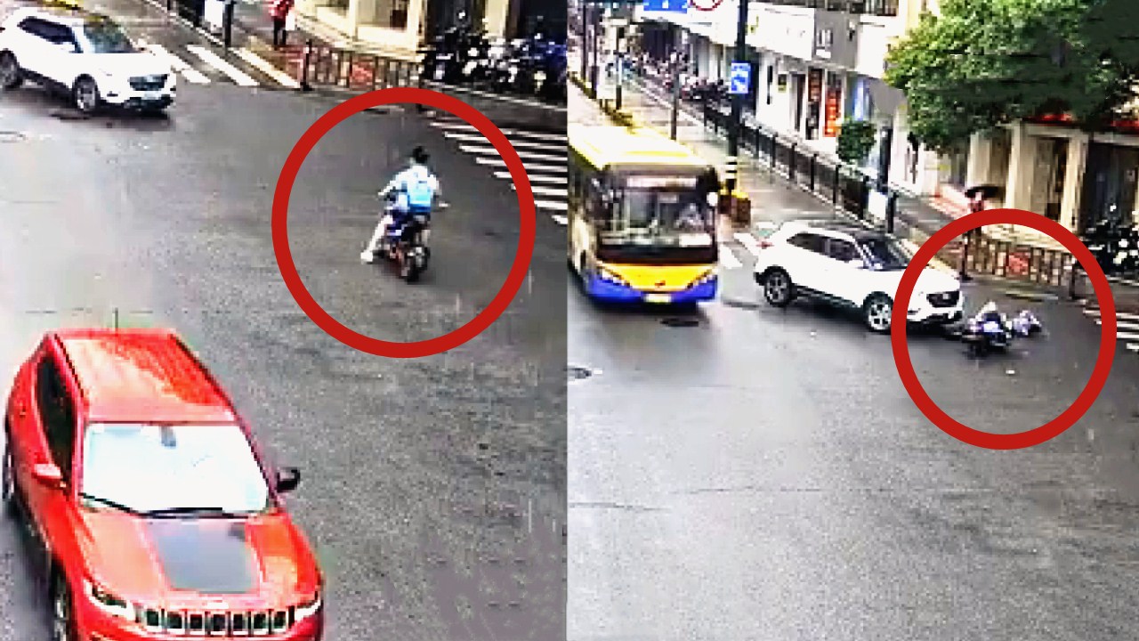 刹不住车!监拍:疾驰电动车雨天失控 滑行十多米迎撞汽车!