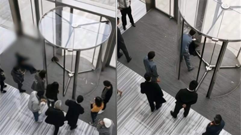 宠物狗被卡旋转门女子倒地哭喊 物业无奈拆门称其违规还不牵绳
