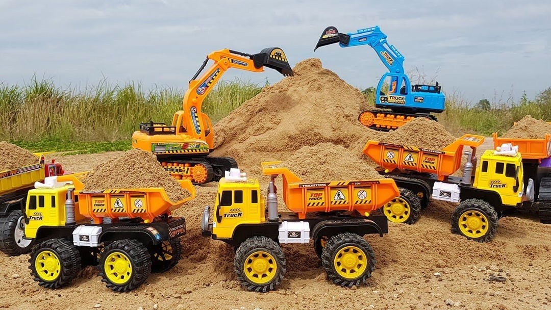 小型挖掘机装载机铺路表演