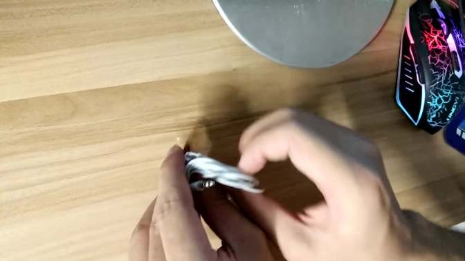 创意个性手机绕线器使用方法