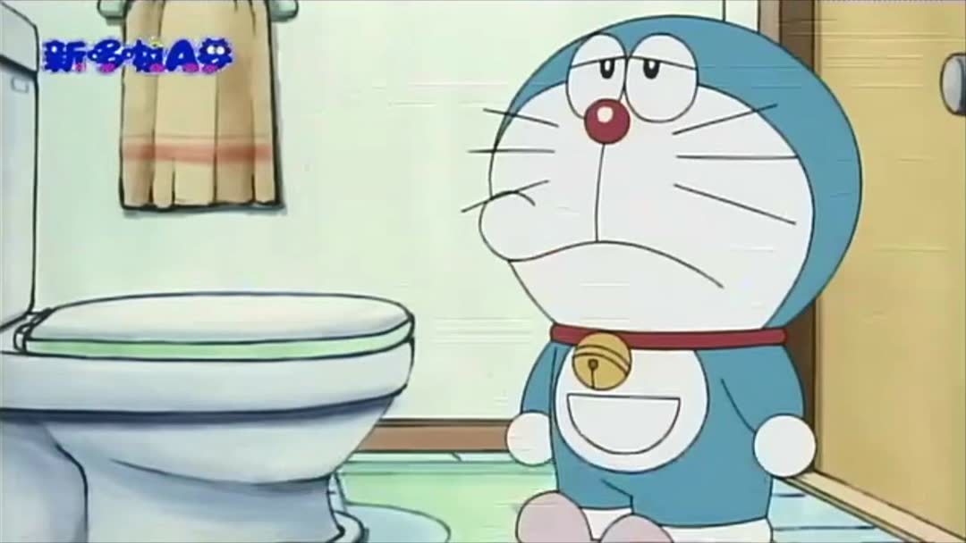哆啦a梦被机器人时钟逼着按时间上厕所,但他此刻根本不想上厕所