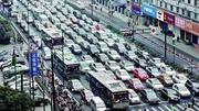 明年北京购车指标减9万 拥堵费最快2015年开收