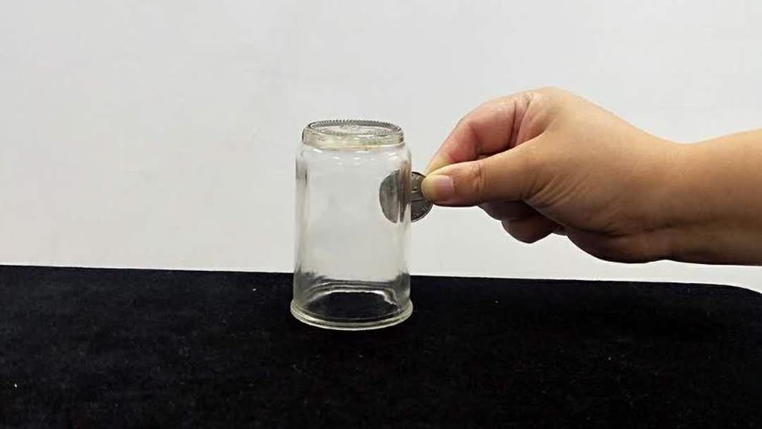 魔术揭秘:硬币穿越杯子,纯手法,简单易学