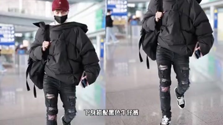 张艺兴现身机场太高调了,反穿羽绒服漏搭配小红帽,瞬间变潮男