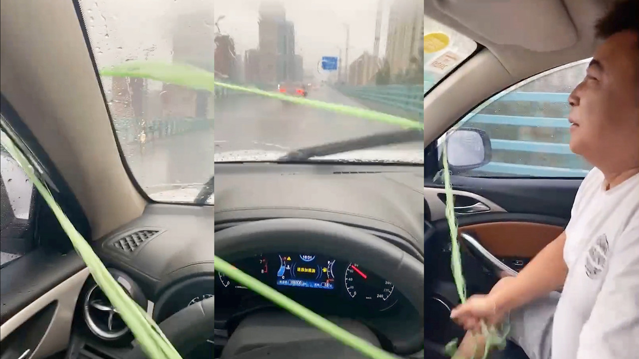 副驾驶比驾驶员都忙!雨刷器坏了,男子急中生智开启“手动模式”