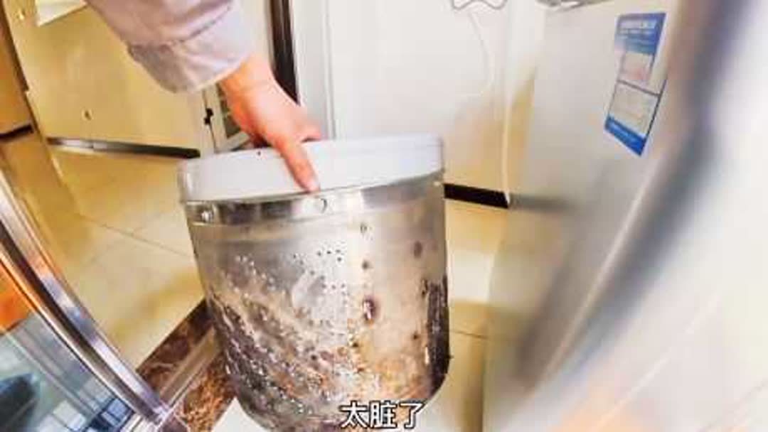 使用5年的洗衣机,洗完衣服有黑点,问题就出现这里