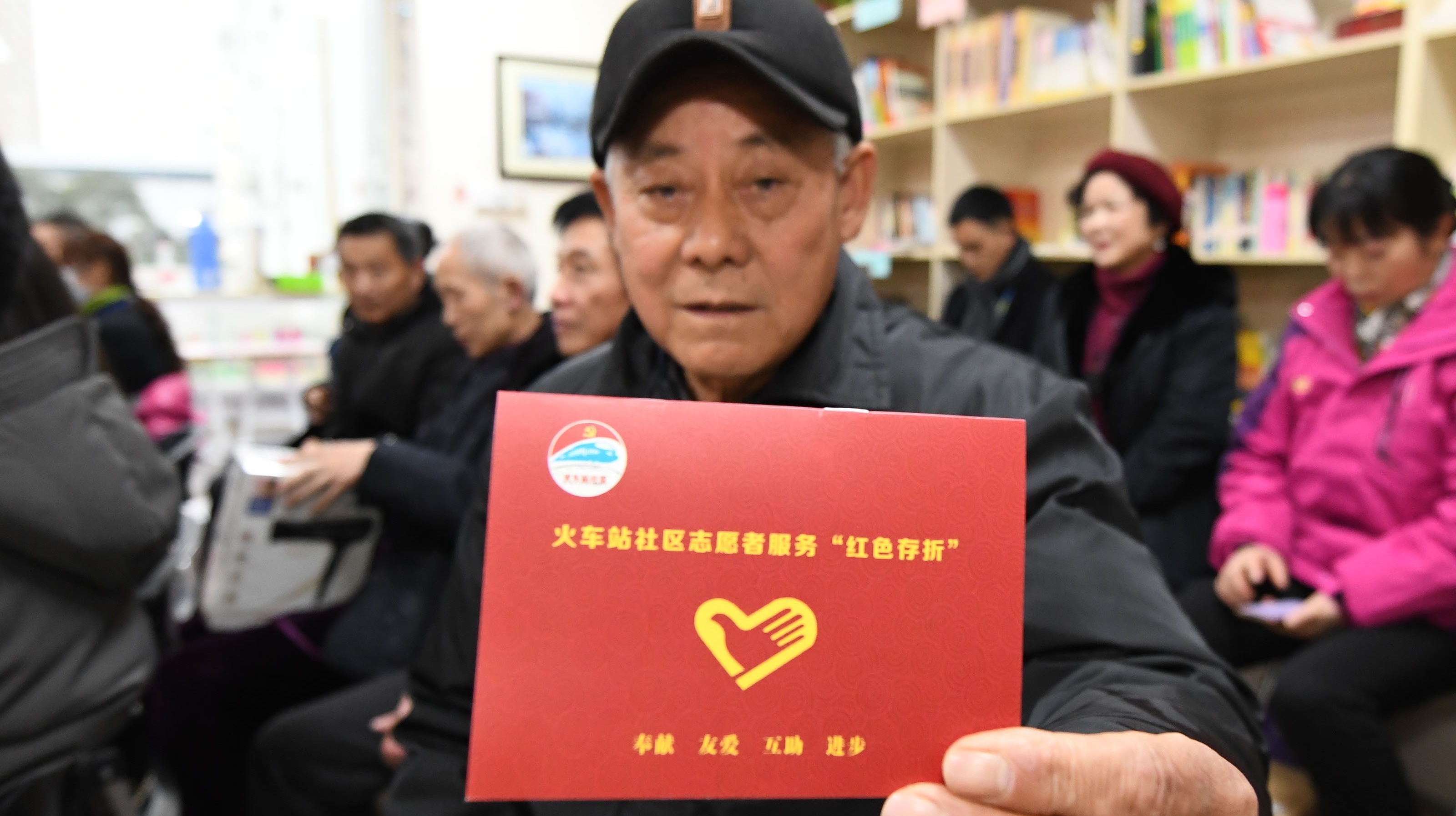 ...社区"文明行为银行支行",存爱心,积分兑换暖...