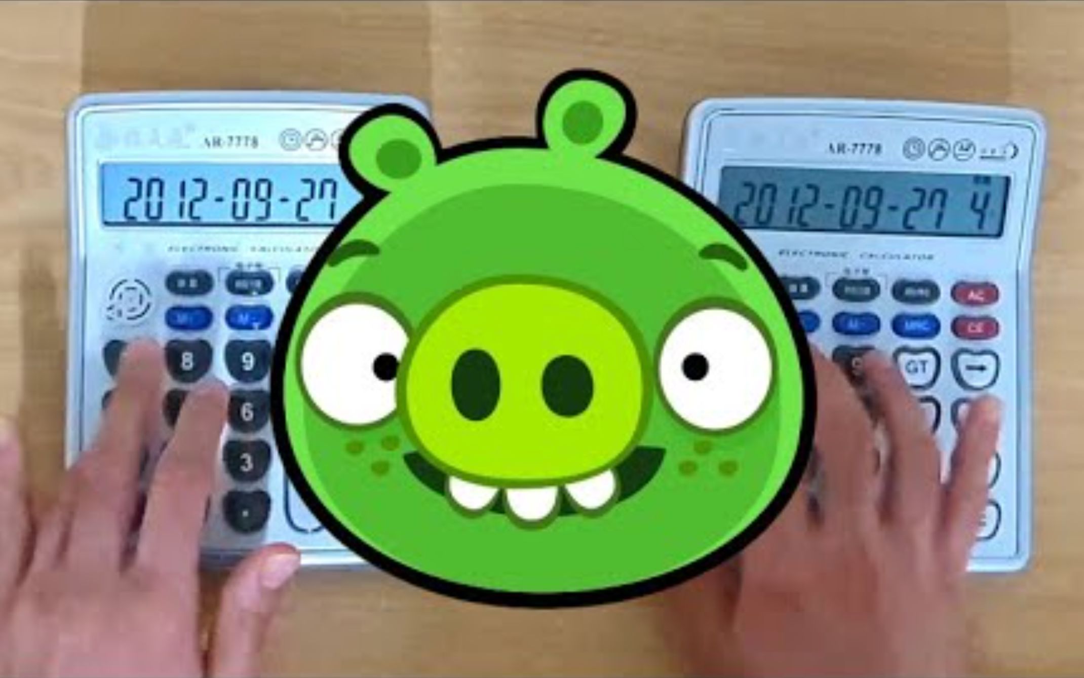 用2台计算器演奏游戏《捣蛋猪》主题曲