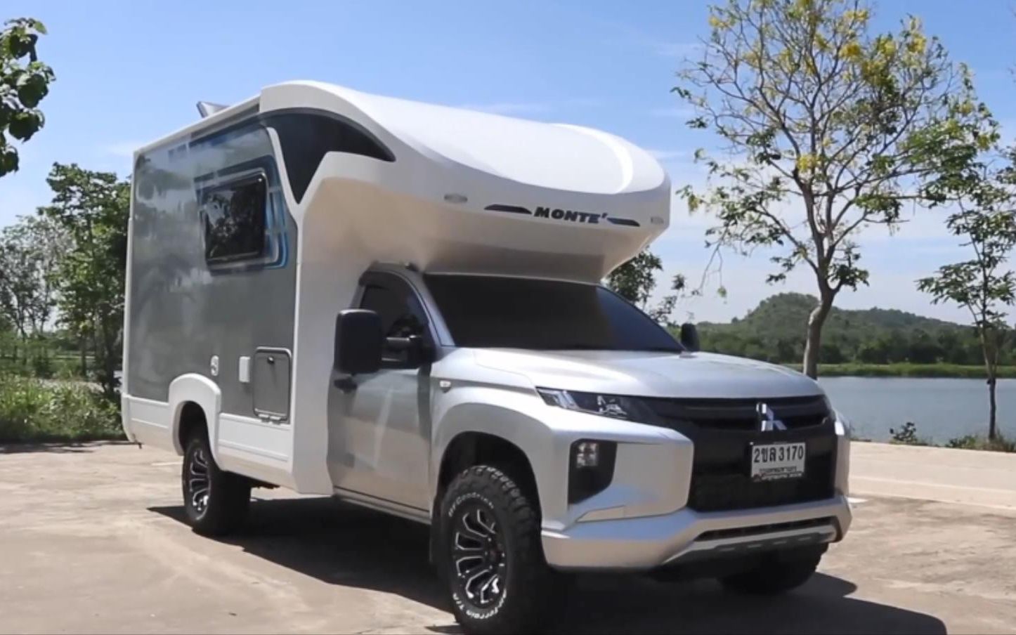 三菱L200皮卡房车实拍!全时四驱能住4口人,和长城炮比你选谁?