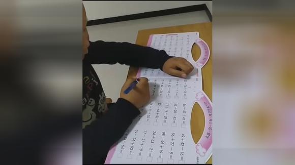教儿子做算术题