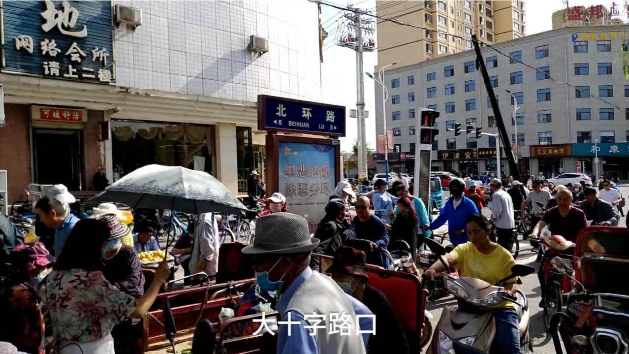 大型十字路口多少人是自觉遵守交规,有多少人骑电动车佩戴头盔