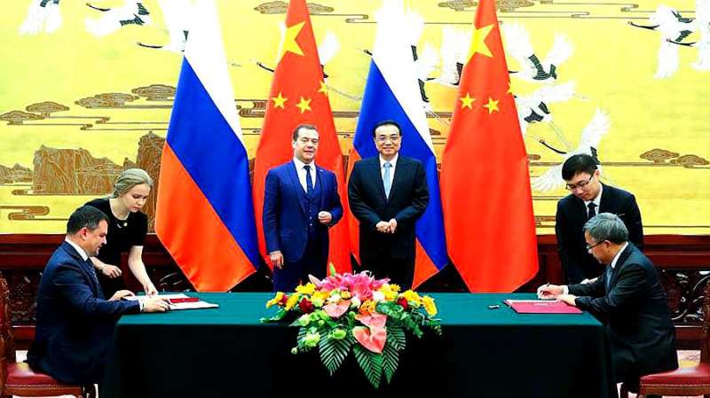 俄罗斯总理刚来中国,连续签署多张大单,美企:再不去就来不及了