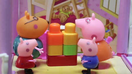 乔治用积木搭城堡,老是搭不好,在妈妈的鼓励下终于搭好了!