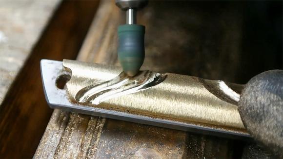 制作一枚外形还不错的裁纸刀。