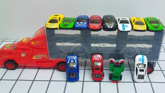 箱式货车,装满了各种小轿车