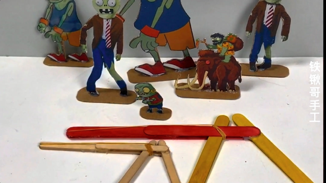 国庆用8个雪糕棒做的皮筋玩具枪,超有趣的手工玩具