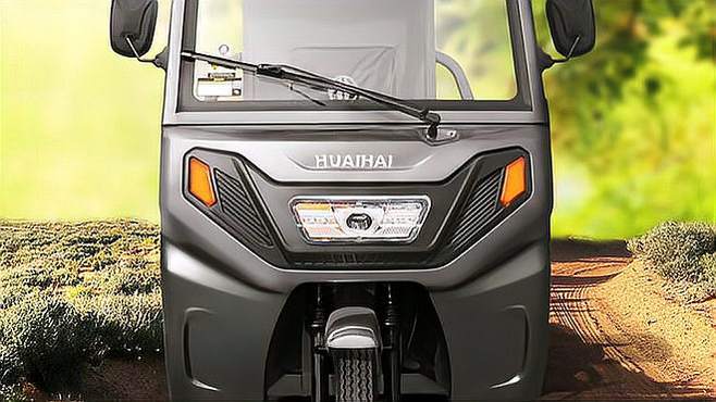 淮海推出一款半篷三轮车,配豪华驾驶舱,载人拉货,一车多用