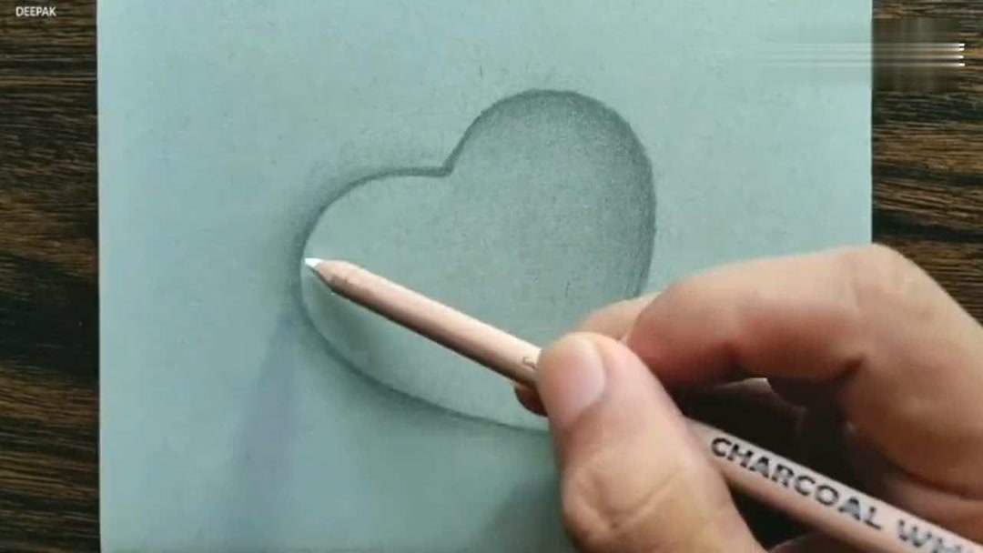 教你如何在一张纸上弄个爱心立体水滴