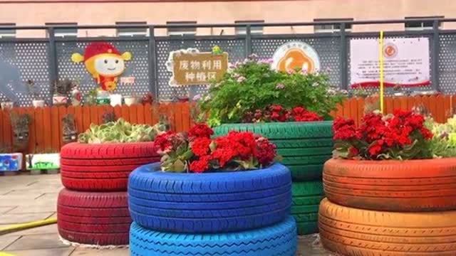 垃圾分类巧筑屋顶花园 北京二里庄社区厨余垃圾变废为宝当花肥