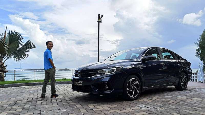 105车评—百公里油耗4升,有大空间的享域锐·混动有什么不一样?