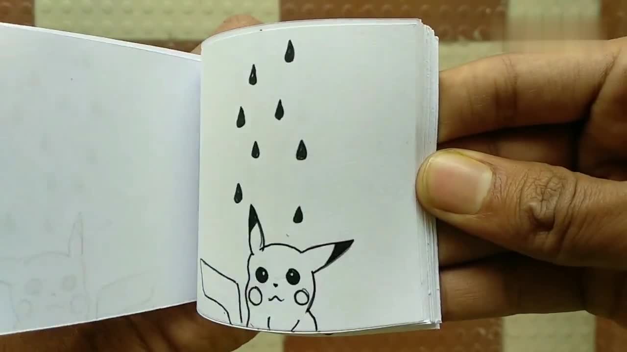 手工动画,在本子上画皮卡丘