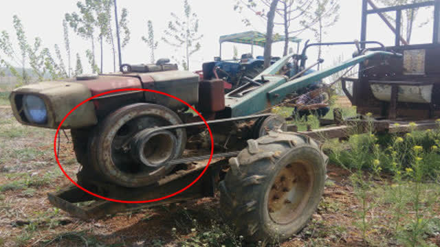 拖拉机上的柴油发动机,为啥要装一个很大的飞轮?原来还有这作用