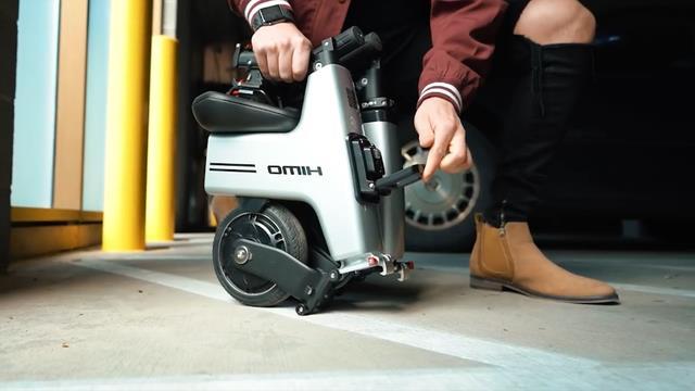 能塞进包里的电动车,折叠后只有A3纸大小,满电能跑30公里!