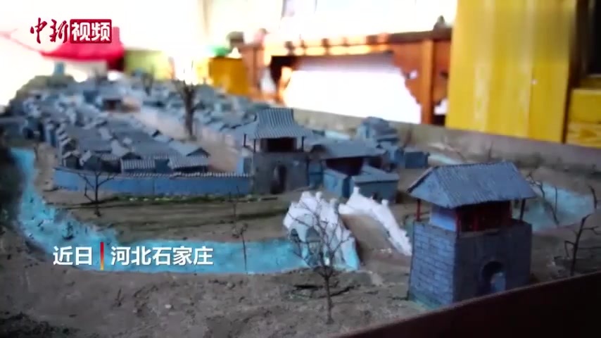 七旬老人自制沙盘1600多座房舍再现古村风貌