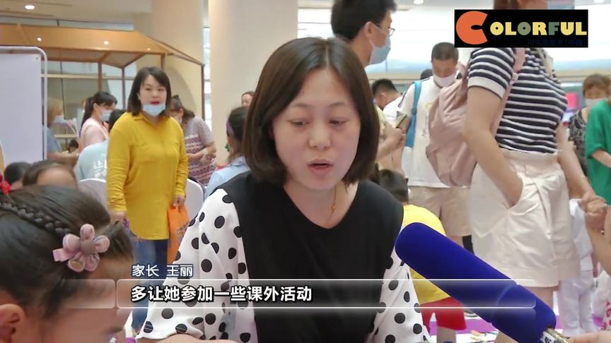 大连电视台新闻播报-采访可乐菲会员家长