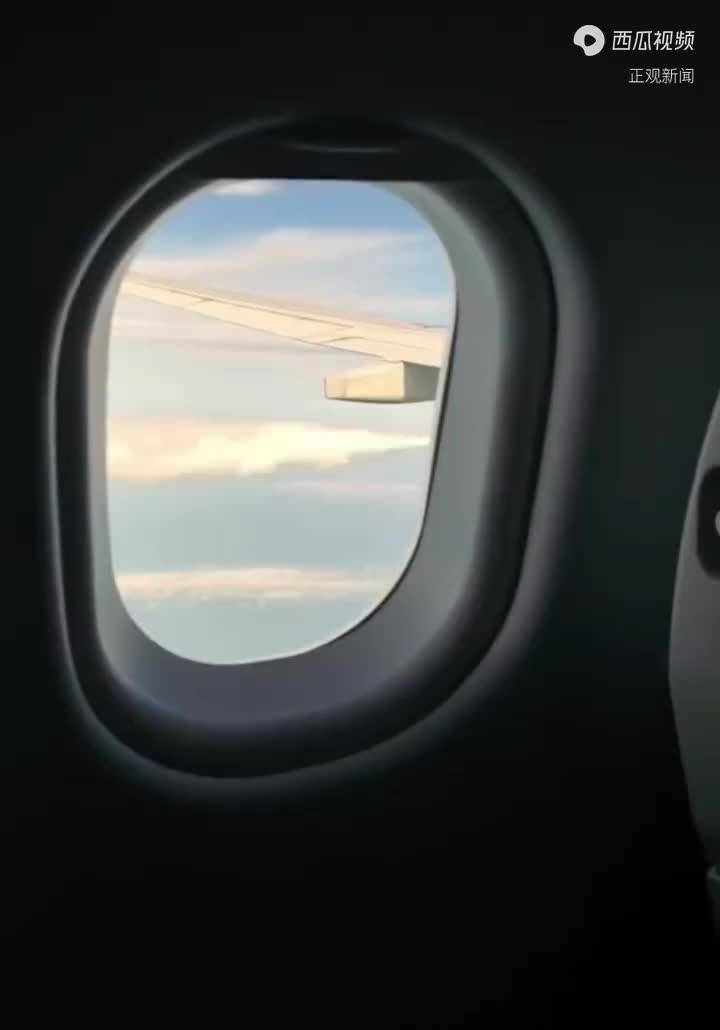 上海飞伦敦MU533航班疑因故障返航,乘客拍下飞机空中放油过程