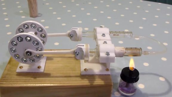 简单的方法制作斯特林发动机,加热运行的很快