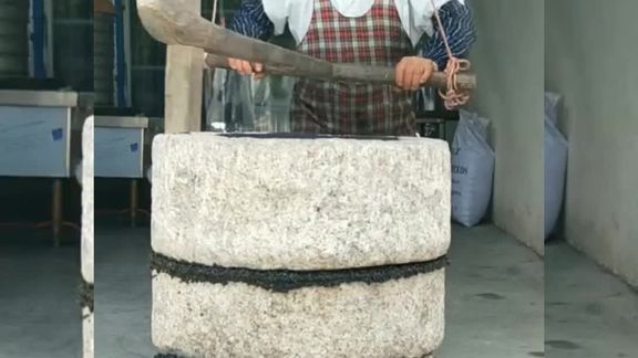 传统的磨粉机,你看过吗