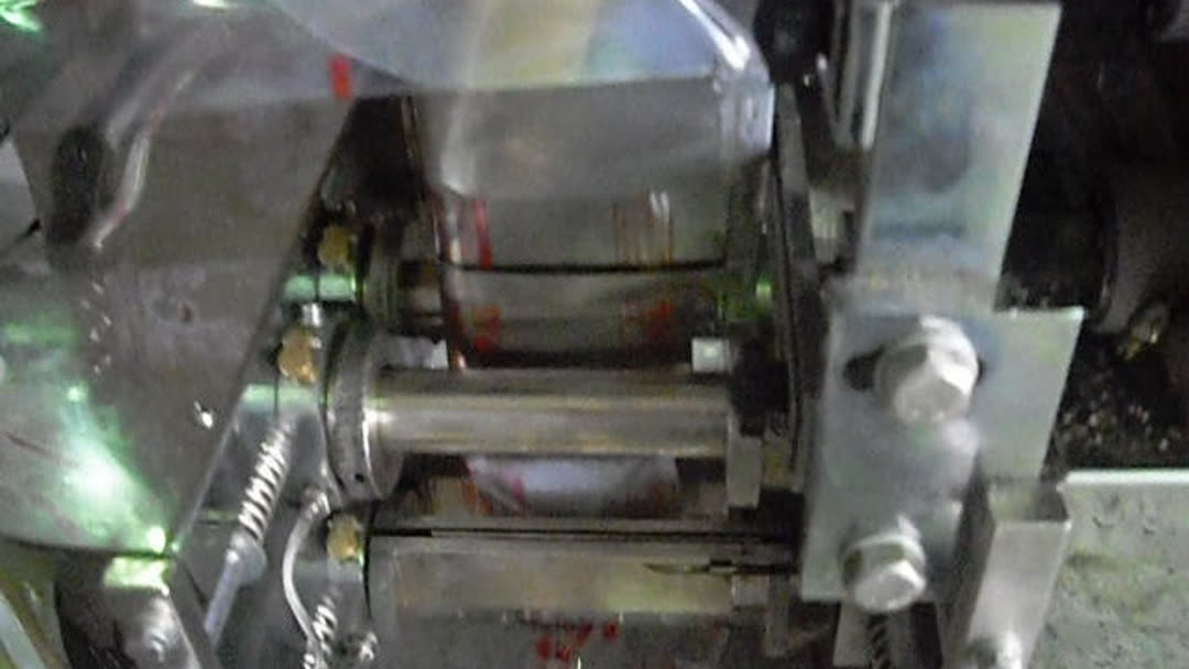 QD-18-II内外袋挂线挂标包装机,挂线挂标包装机