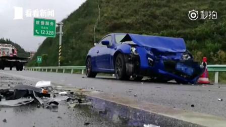 男子雨天开跑车一路狂飙 路面打滑撞护栏车头严重损毁